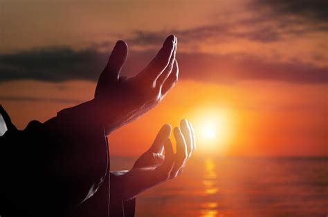 Premium Photo Silhouette Of Hands Praying On Sky Background