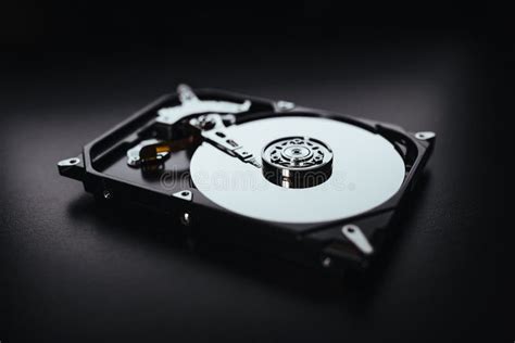 Disassembled Hard Drive From The Computer Hdd With Mirror Effects Part Of Computer Pc