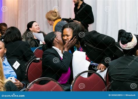 Diverse Woman Networking At Corporate Convention Event Editorial Image