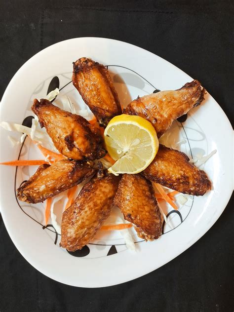 7 Панирани пилешки крилца или със соев сос 新长城 Син Чан Чен