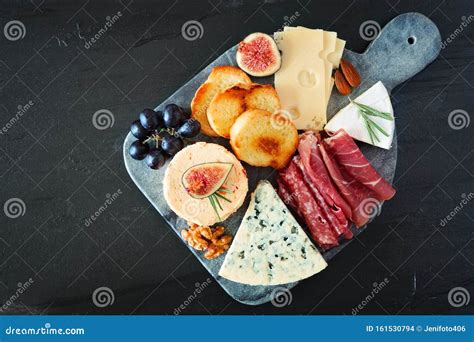 Appetizer Platter With Assorted Cheeses And Meats Overhead View On A