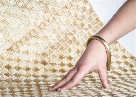 Zsofia Kollar Weaves Human Hair To Create Golden Tapestry