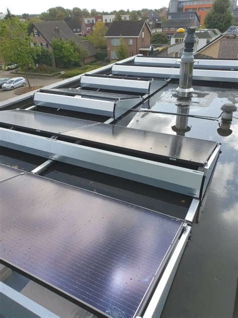 Zonnepanelen Op Een Plat Dak Zo Haal Je Er Het Meest Uit Zonnepaneel Experts