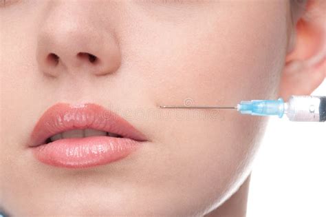 Injection Of Botox To The Face Of Beautiful Woman Stock Photo Image Of Botoxreg Beautiful