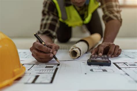 Professional Architect Designer Structural Engineer Working With Blueprint Design Project Stock