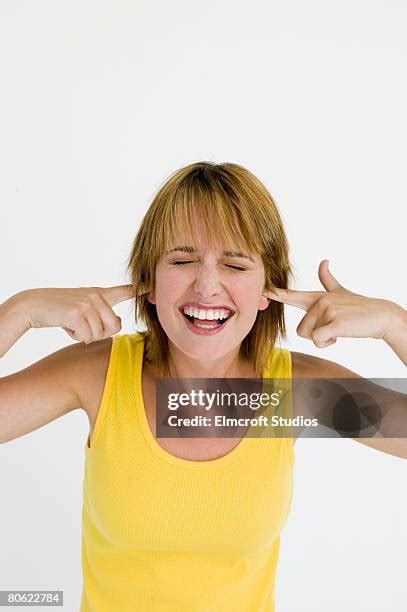 Plugging Her Ears Photos And Premium High Res Pictures Getty Images