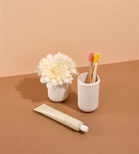 Premium Photo Cleaning The Teeth With Ecological Toothbrushes And Eco