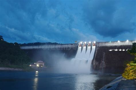 Water Splashing From Floodgate Khun Dan Prakarn Chon Huge Concrete Dam On Night In Thailand