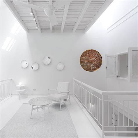 canvas house is a co living space in singapore with all white interiors