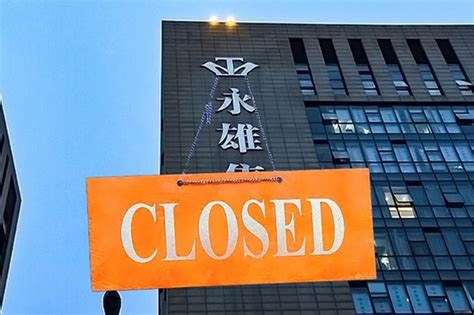 chinese debt collector suspends business after police raids caixin global