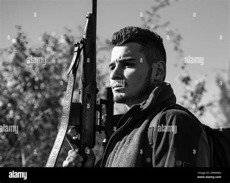 Hunter With Shotgun Gun On Hunt Man Holding Shotgun Clothes For The