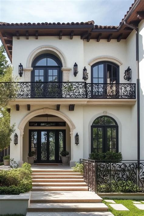 Modern Mediterranean Revival Architecture Home Facade With Wrought Iron
