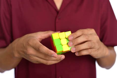 Man Hands Holding A Rubik Cube Stock Photo At Vecteezy