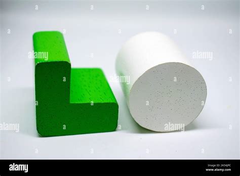 Circle And L Geometry Made Of Wood Laid On A White Background Stock Photo Alamy