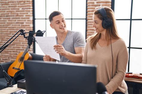 Man And Woman Musicians Singing Song Playing Piano Keyboard At Music