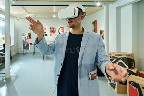 Man Scrolling Through Virtual Artworks Stock Image Image Of Caucasian