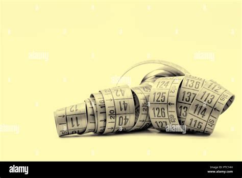 blur red tape measure in the white light like concept of diet and
