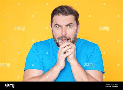 Emotional Scared Man Looks With Frightened Expression Nervously