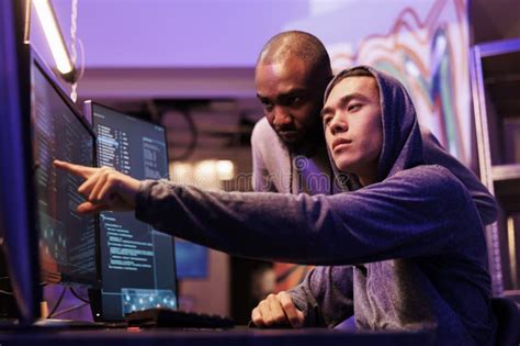 hacker pointing at malware on screen stock image image of american