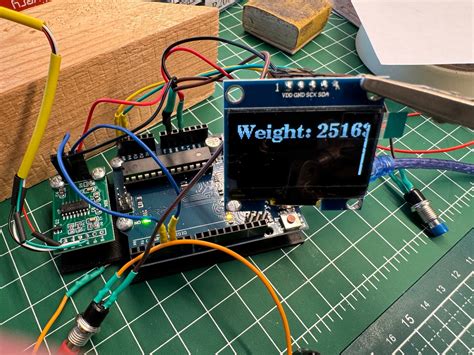 Getting Weight From Load Cell On To Oled Programming Arduino Forum