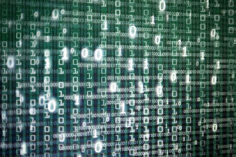 binary code data bit screen display on laptop computer screen matrix of