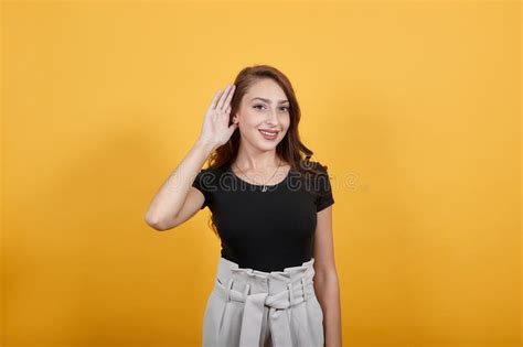 Girl Finding Difficulty Is Hearing Something So She Uses Her Hand