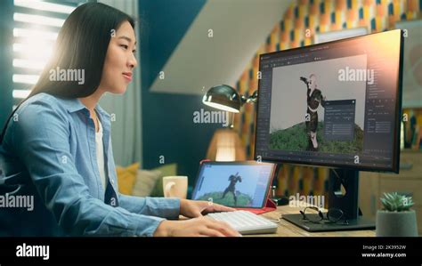 asian female 3d designer creating visualization and animation for video