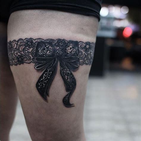 50 Lace Belt Garter Tattoos Designs 2024 Gun Bow On Thigh Leg