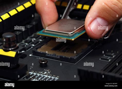Installing Central Processor Unit Into Motherboard Stock Photo Alamy