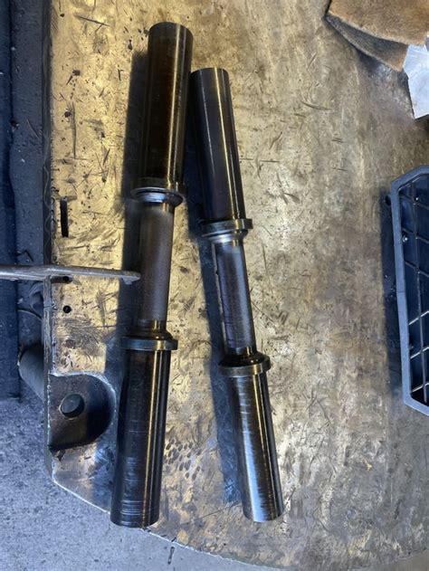 custom 20 5” loadable dumbbells made by my grandpa for the home gym r