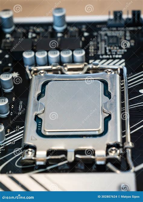 Closeup View Of A Cpu Socket With Processor Installed On A Black