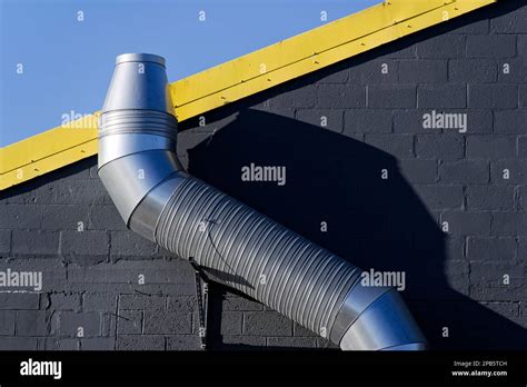 Flue Chimney Fixed To Building Exterior Wall Stainless Steel From