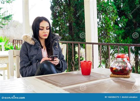 Girl Uses A Smartphone Lunch In The Restaurant Stock Image Image Of Business Cafe