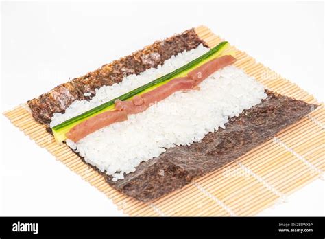 Sushi Roll Japanese Dish Tuna And Cucumber With Spicy Wasabi Maki Open