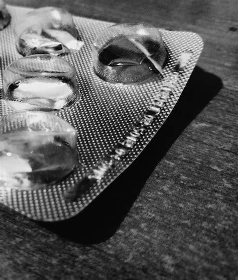 Premium Photo High Angle View Of Blister Pack On Table