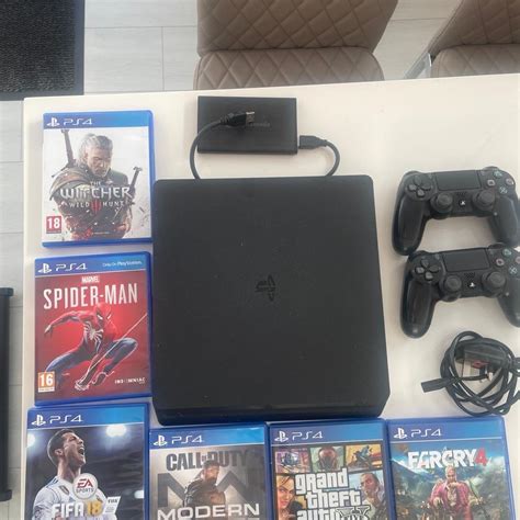 PlayStation 4 Slim - 2 controllers and games in B33 Birmingham für 150 ...