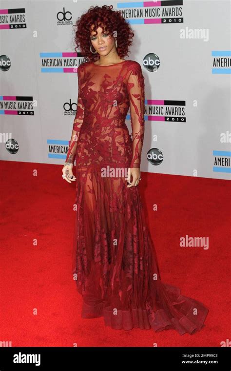 Rihanna Is Red Hot In A Sheer Lace Backless Dress And Fiery Red Hair At