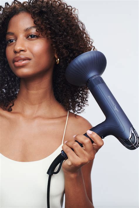 Mastering The Art Of Using A Diffuser For Defined Frizz Free Curly