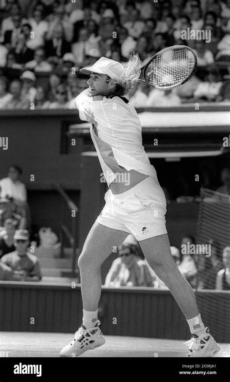 Andre Agassi Playing On Centre Court At Wimbledon Tennis Tournament In