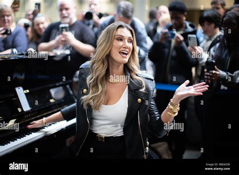 Delta Goodrem Surprises Commuters With A Piano Performance At St