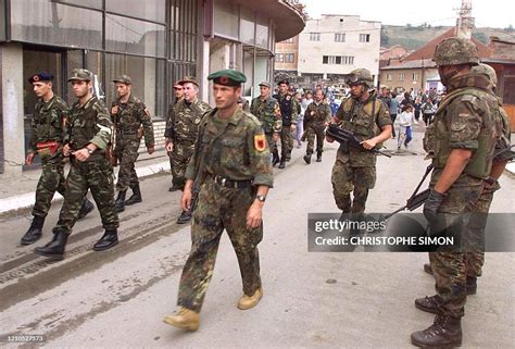Kosovo Liberation Army Fighters Walk 18 June 1999 In Orahovac 20 Km