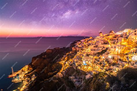 Premium Photo Oia Village In Sunset Light With Stars And Milky Way