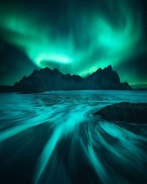 Awe Inspiring Northern Lights Over Vestrahorn Mountain In Iceland