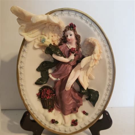 Unk Accents Angel Holding Roses And Bird Bas Relief Sculpted Oval