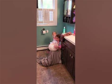 Sisters Big Sis Making Sure Her Little Sis Doesnt Fall Off The Toilet