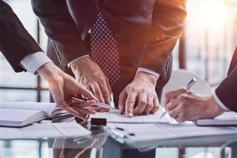 Men Closeup Looking In A Folder With Documents Premium Photo