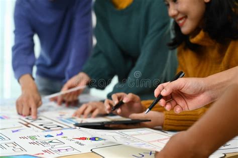 Mobile Application Designers Brainstorming Working On Design Project In Creative Office Stock