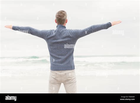Man Standing With Arms Out Wide Stock Photo Alamy