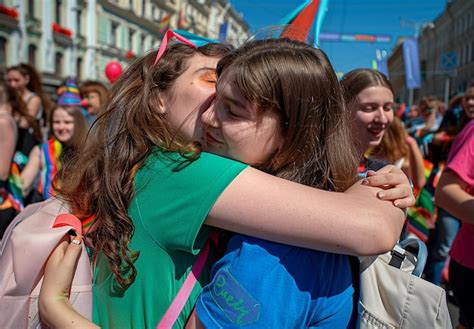 Two Girls Hugging Each Other On Street Premium Ai Generated Image