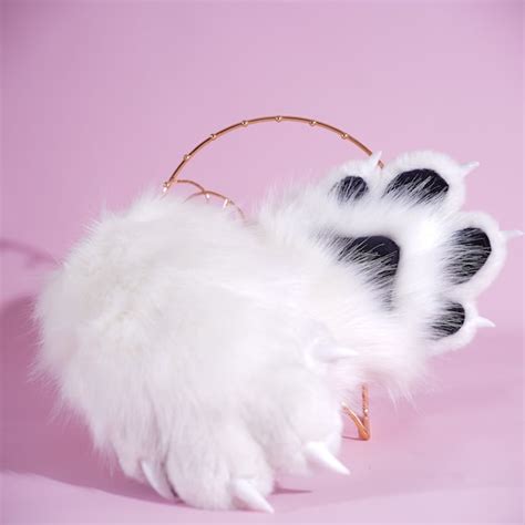 White Cat With Black Paws And Ears